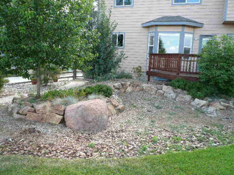 A Complete Guide to Landscaping With Boulders - LawnStarter