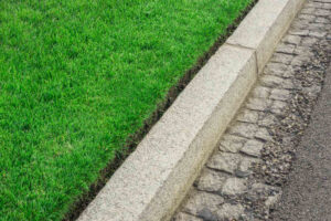 How to Edge a Lawn With a String Trimmer